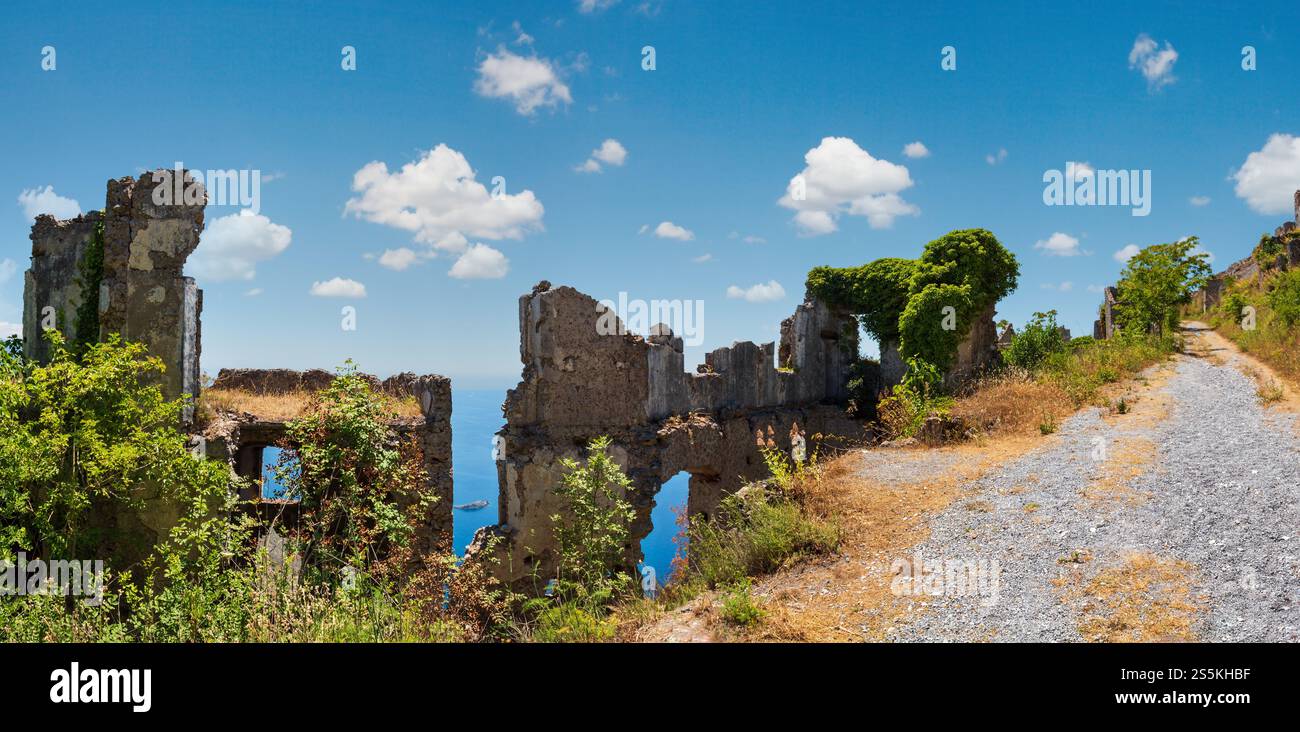 The ruins of the original settlement of Maratea on a rocky escarpment ...