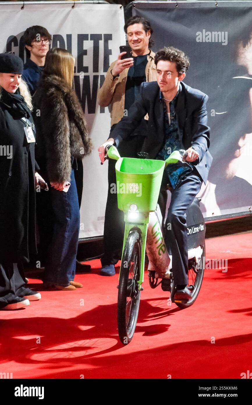 London, UK. 14th Jan, 2025. Timothee Chalamet arrives on a cycle at the ...