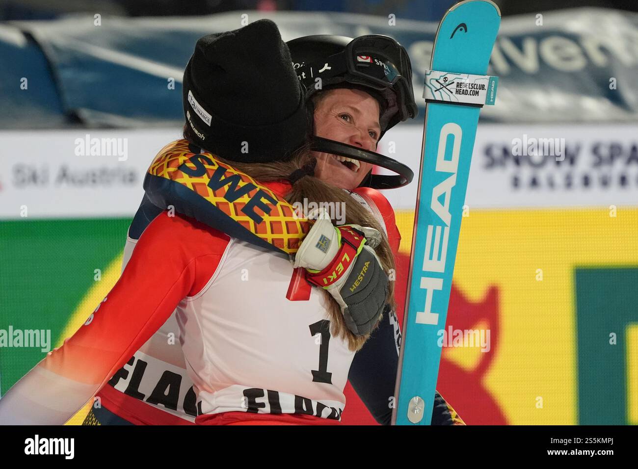 Switzerland's Camille Rast is congratulated by Sweden's Sara Hector ...