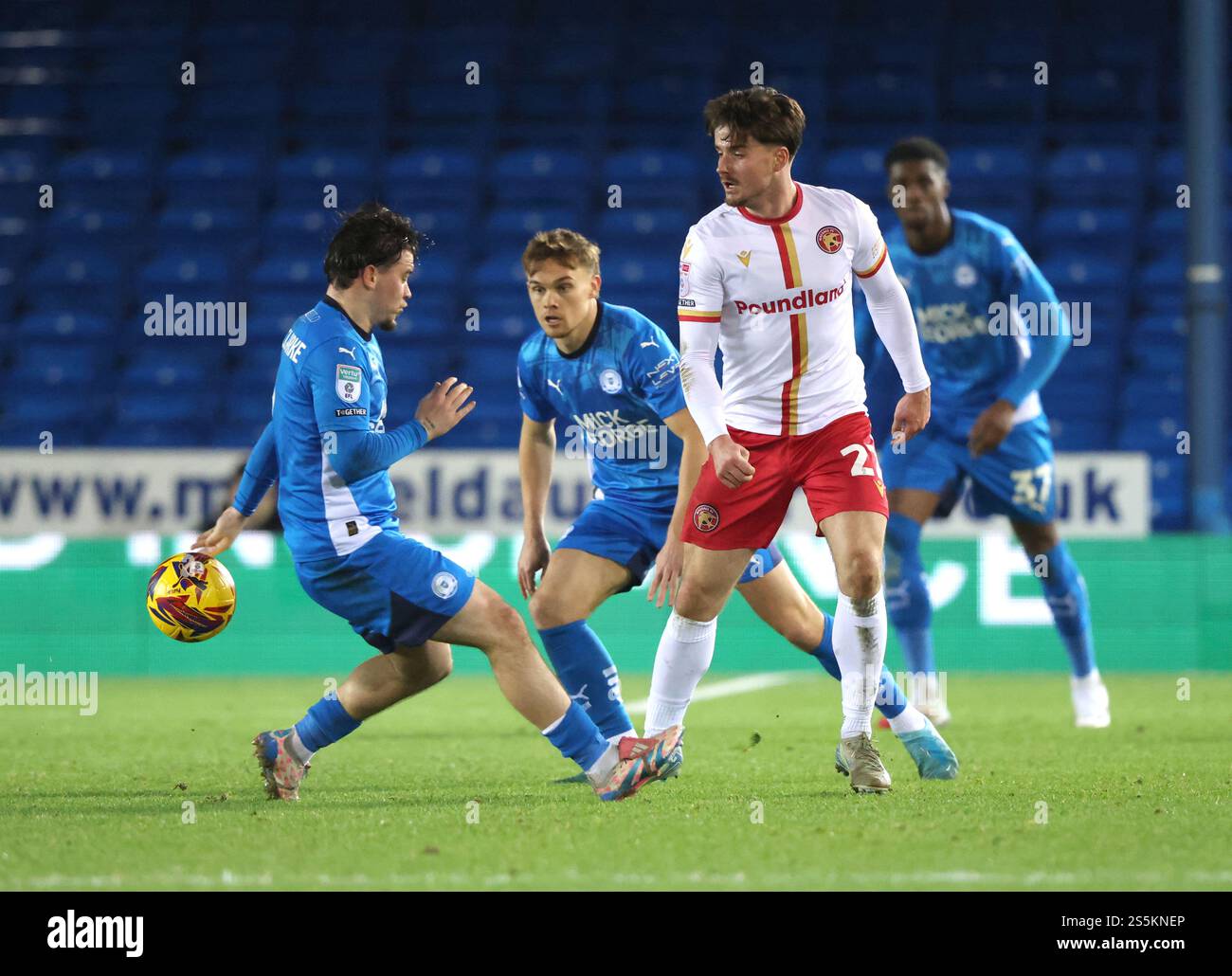 Peterborough, UK. 14th Jan, 2025. Chris Conn-Clarke (PU) Jamie Jellis ...