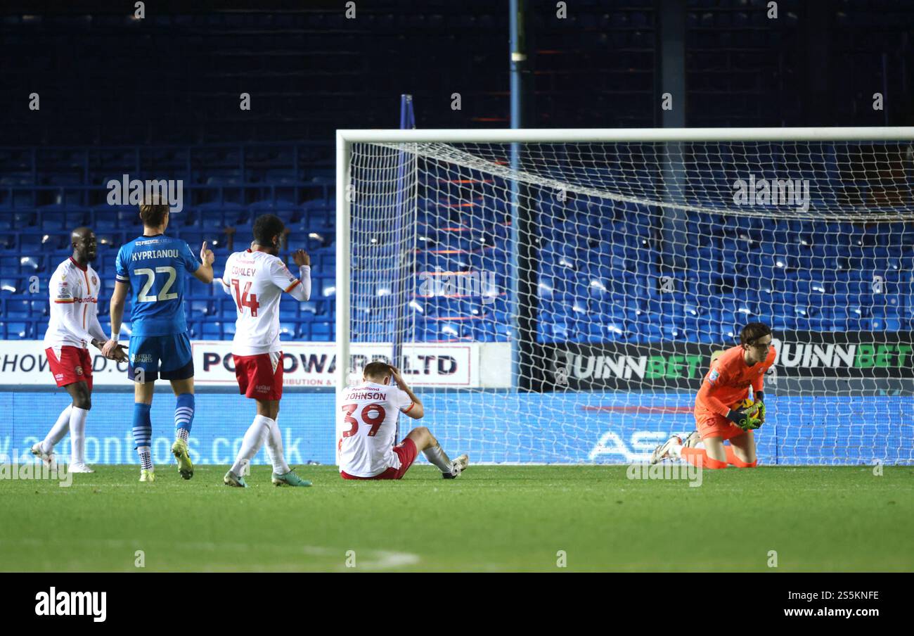 Peterborough, UK. 14th Jan, 2025. Nicholas Bilokapic (PU) foils Danny ...