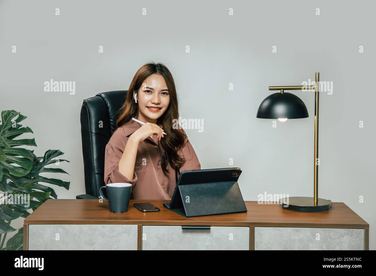 Happily Young asian woman with new normal, she Stay at home and works ...