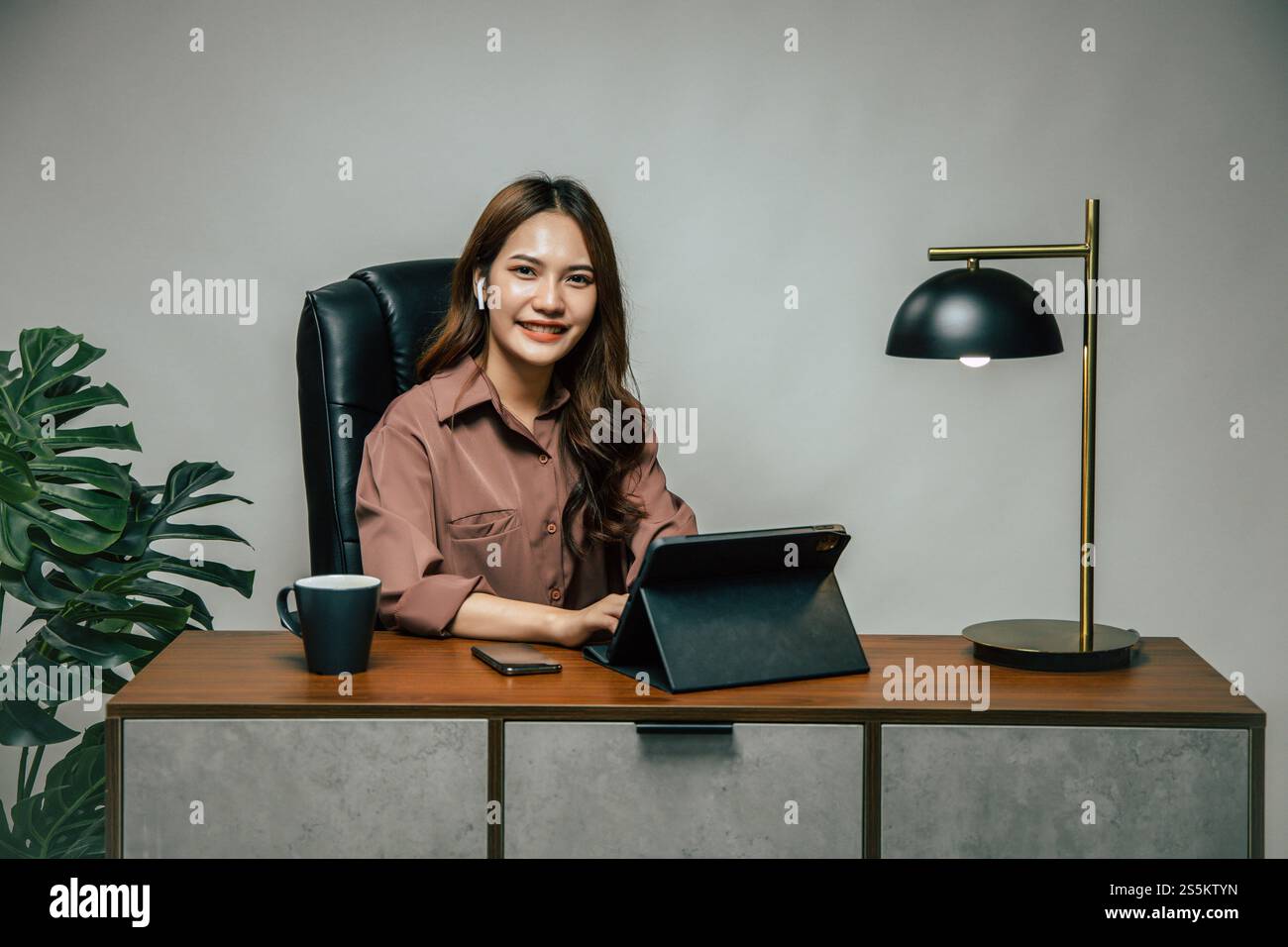 Happily Young asian woman with new normal, she Stay at home and works ...