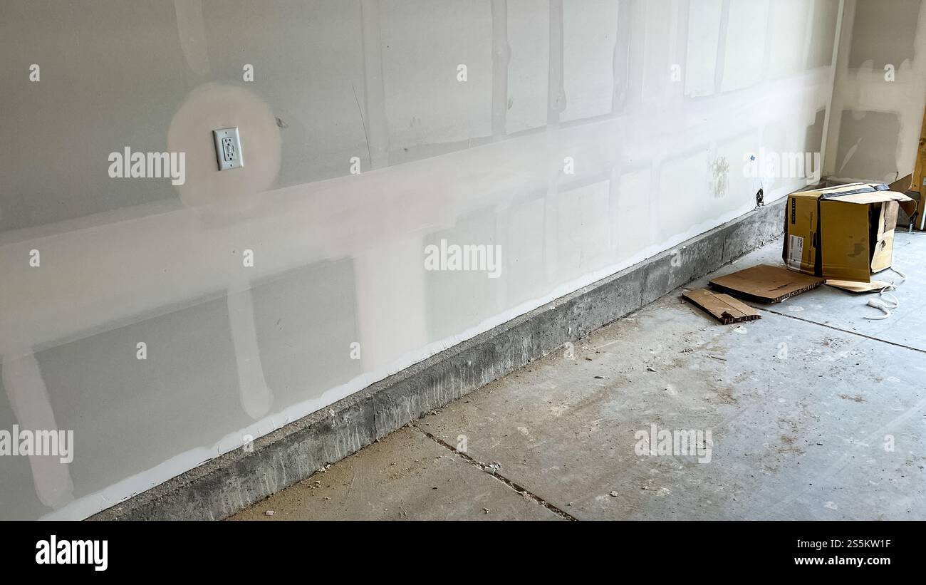 Unfinished Garage Interior in New Construction Home Stock Photo - Alamy
