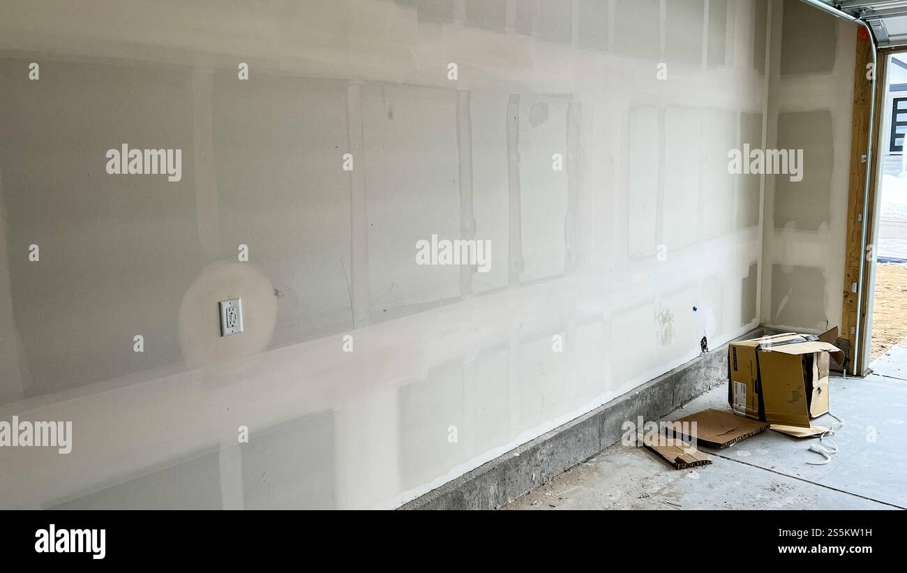 Unfinished Garage Interior in New Construction Home Stock Photo - Alamy