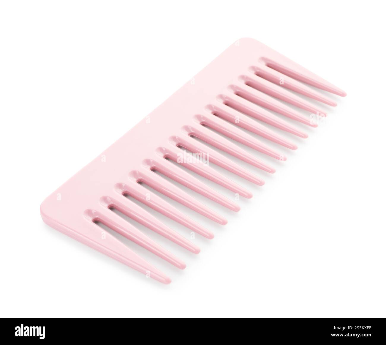 One pink plastic comb isolated on white Stock Photo - Alamy