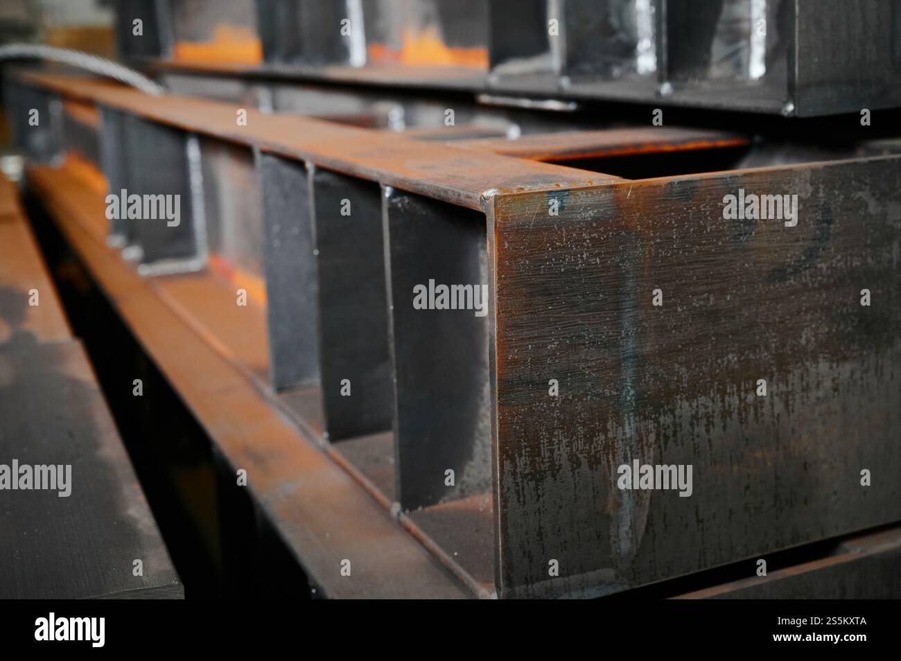 Welded fabrication made of beams stacked in plant warehouse Stock Photo ...