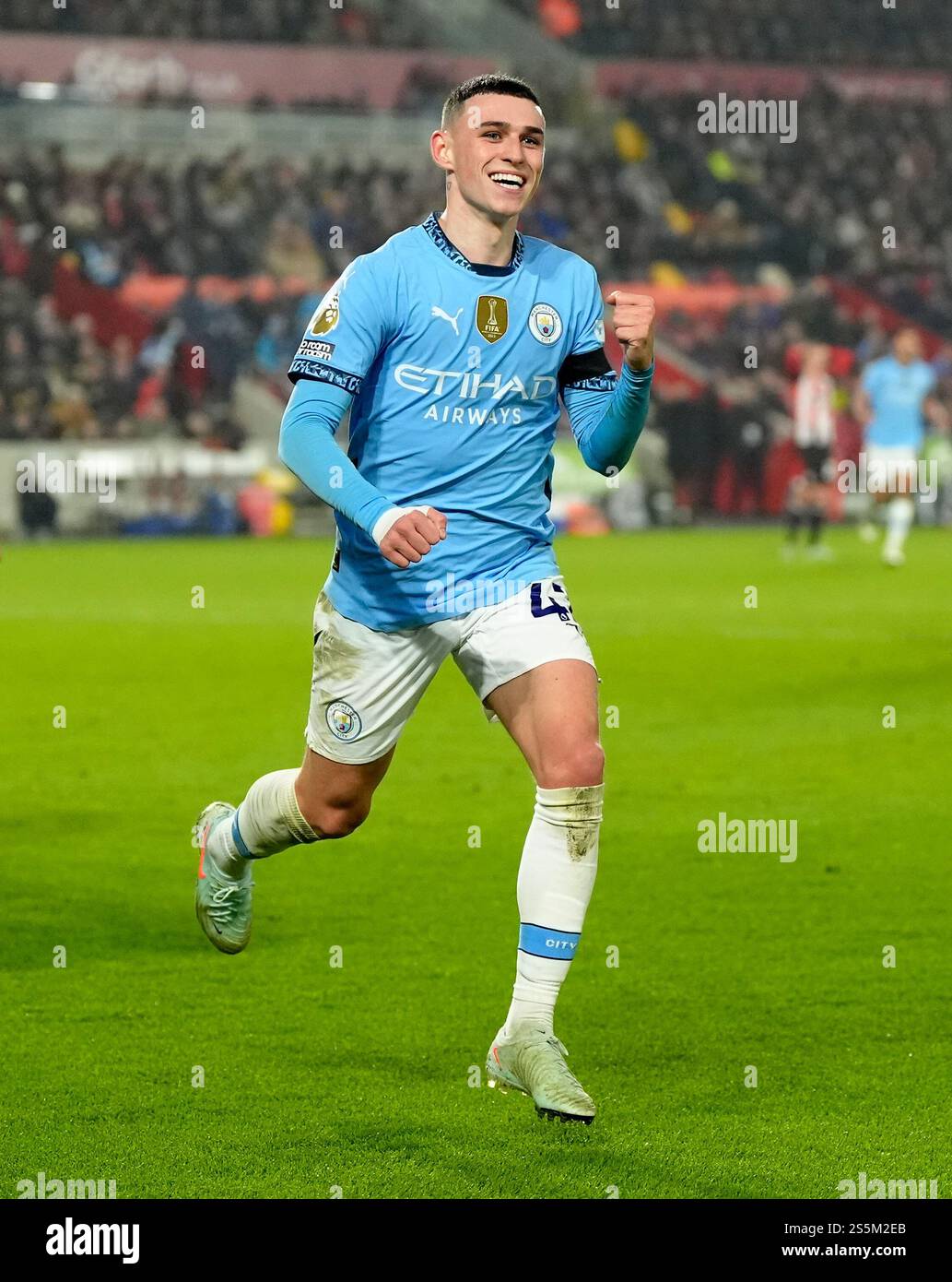 Manchester City's Phil Foden celebrates scoring their side's second ...