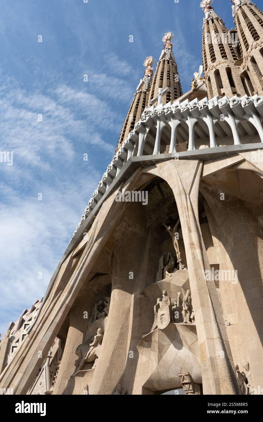 The towering spires and intricate bone-like details of Sagrada Familia ...