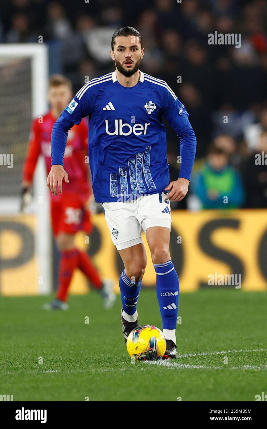 Rome, Lazio, Italy. 10th Jan, 2025. Como's Alberto Dossena controls the ...