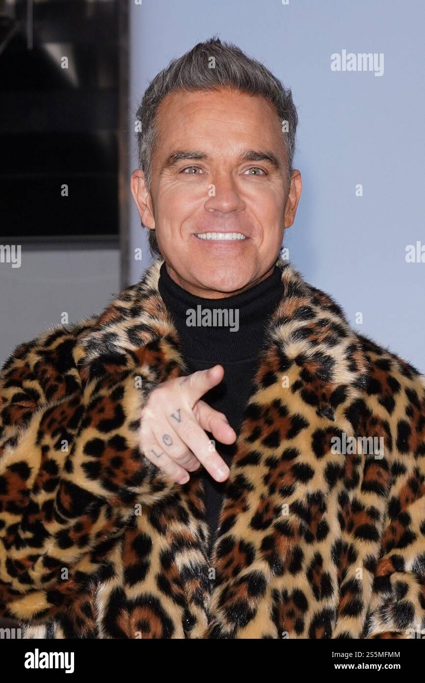 Ny. 14th Jan, 2025. Robbie Williams at a public appearance for Robbie ...