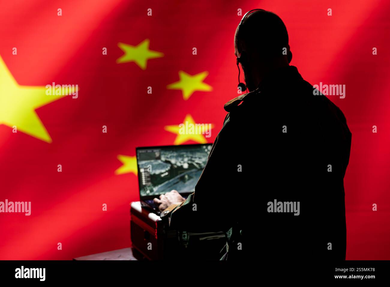 Chinese espionage division spy using reconnaissance software on laptop ...