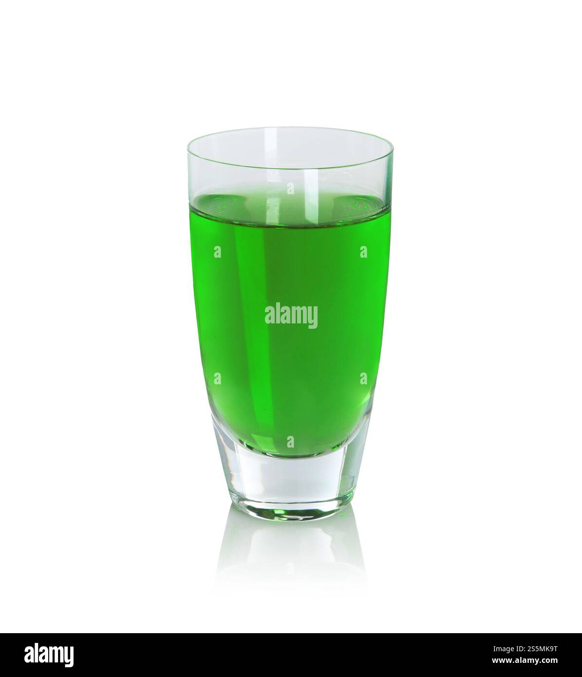 Absinthe in shot glass isolated on white Stock Photo - Alamy