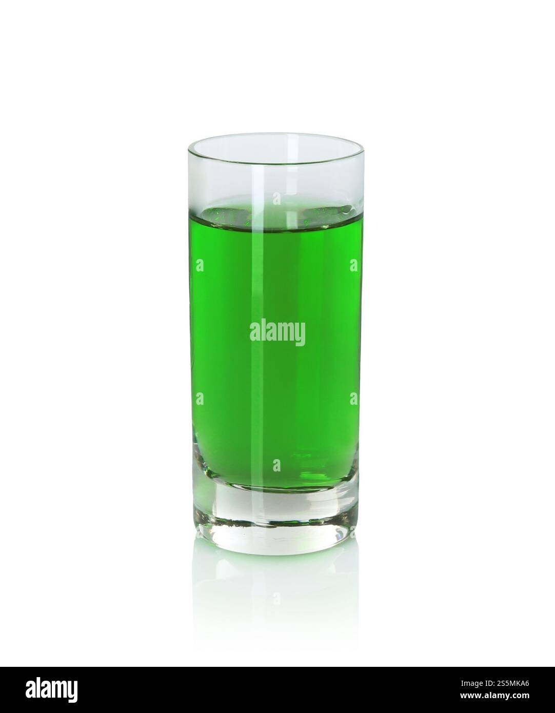 Absinthe in shot glass isolated on white Stock Photo - Alamy