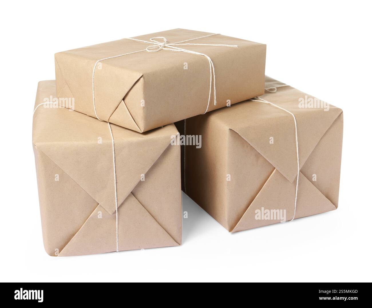 Parcels wrapped in kraft paper isolated on white Stock Photo - Alamy