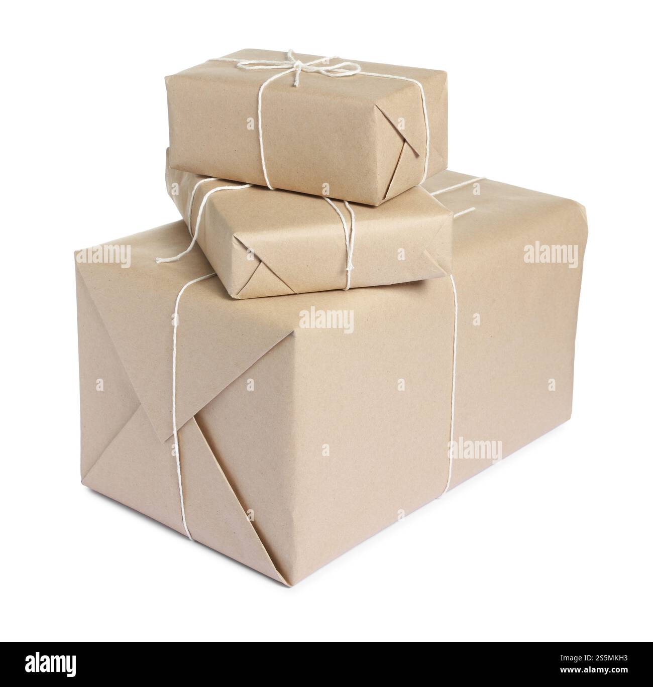 Parcels wrapped in kraft paper isolated on white Stock Photo - Alamy