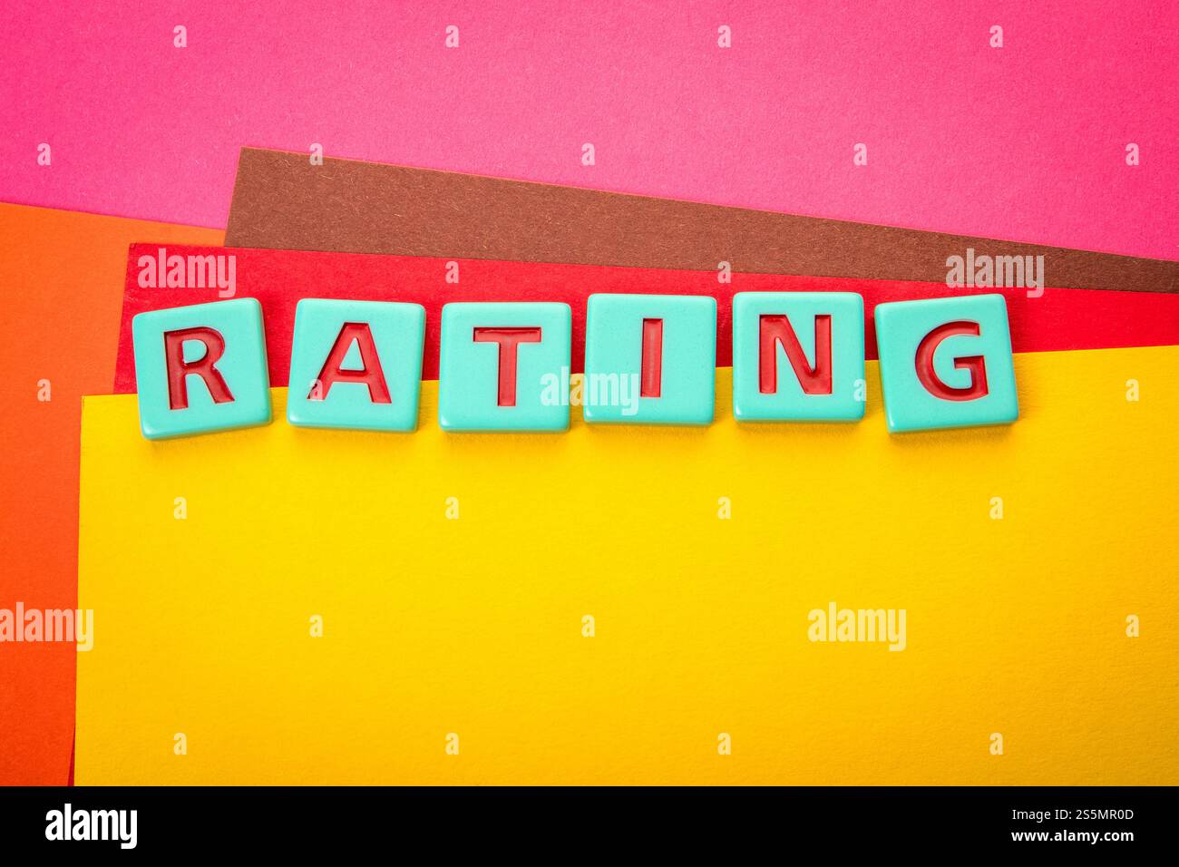 RAITING. Alphabet letter tiles on a red textured background Stock Photo ...