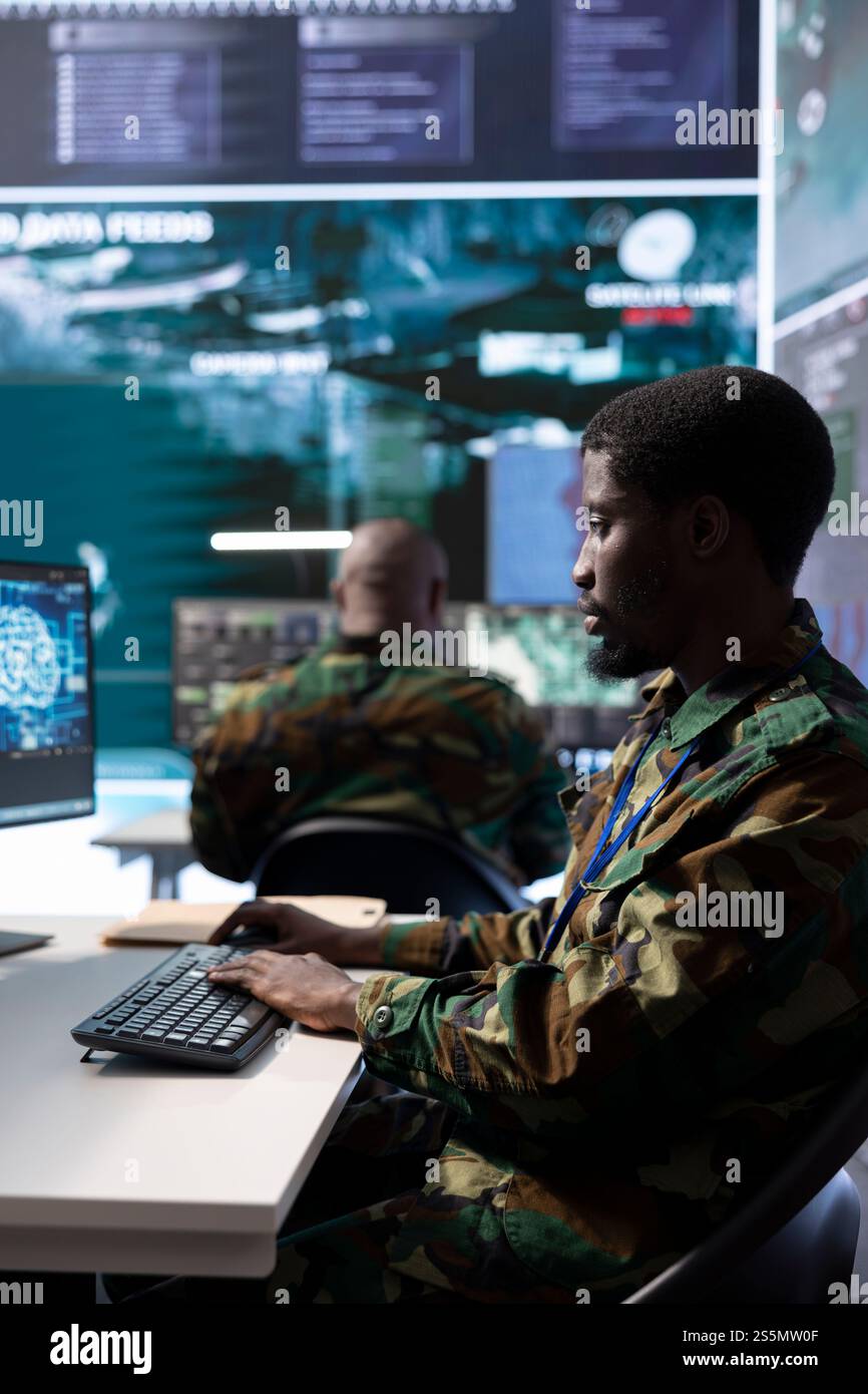 Government analysts work in an advanced command center with satellite ...