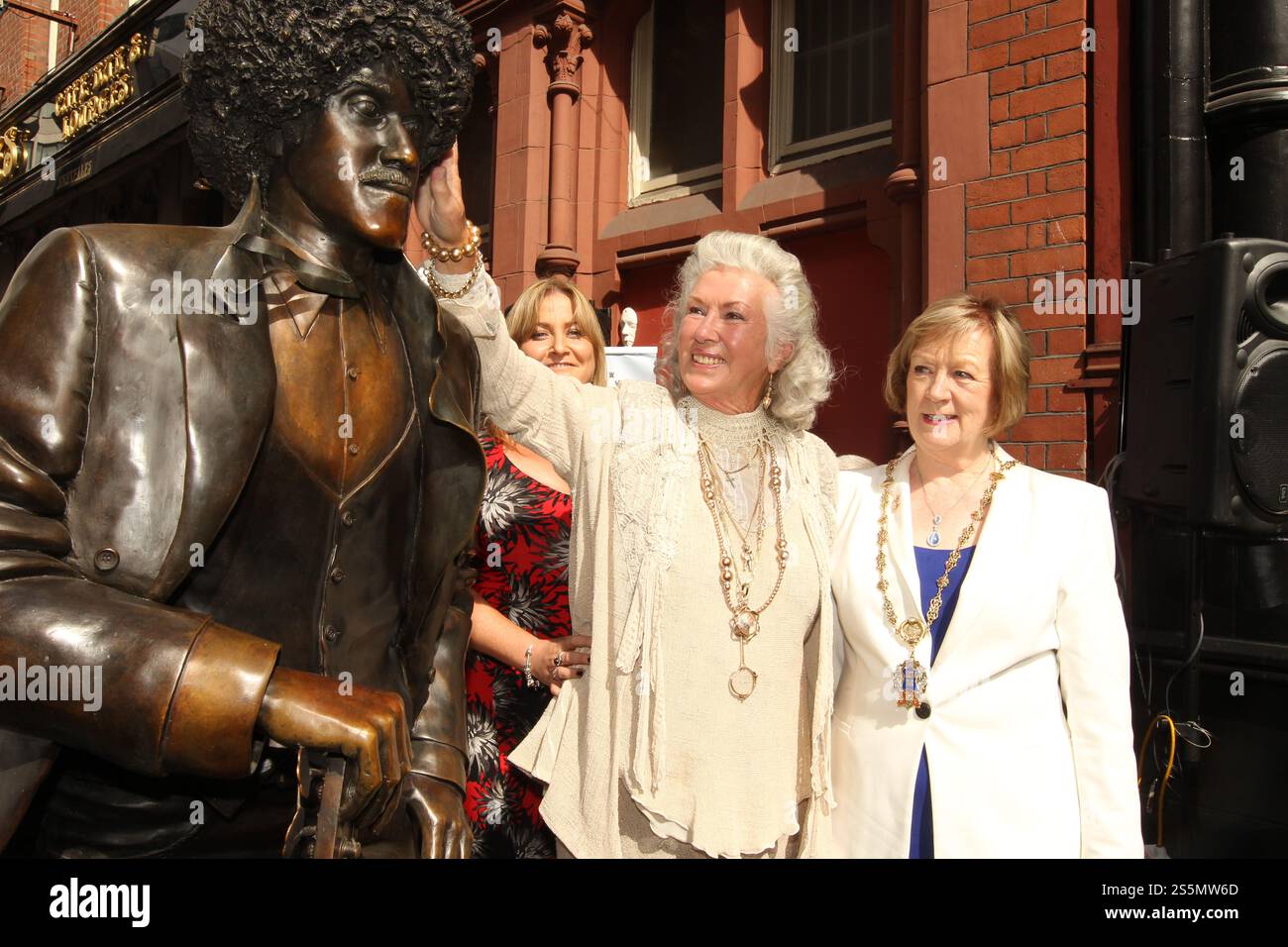 Dublin, Ireland - 15th August 2013 - Philmena Lynott with the statue ...