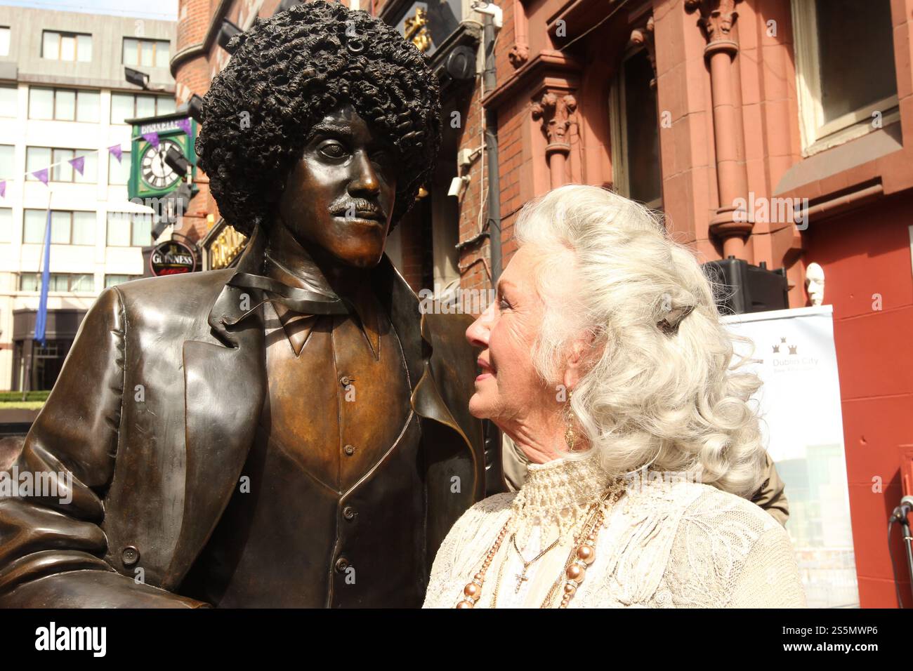 Dublin, Ireland - 15th August 2013 - Philmena Lynott with the statue ...
