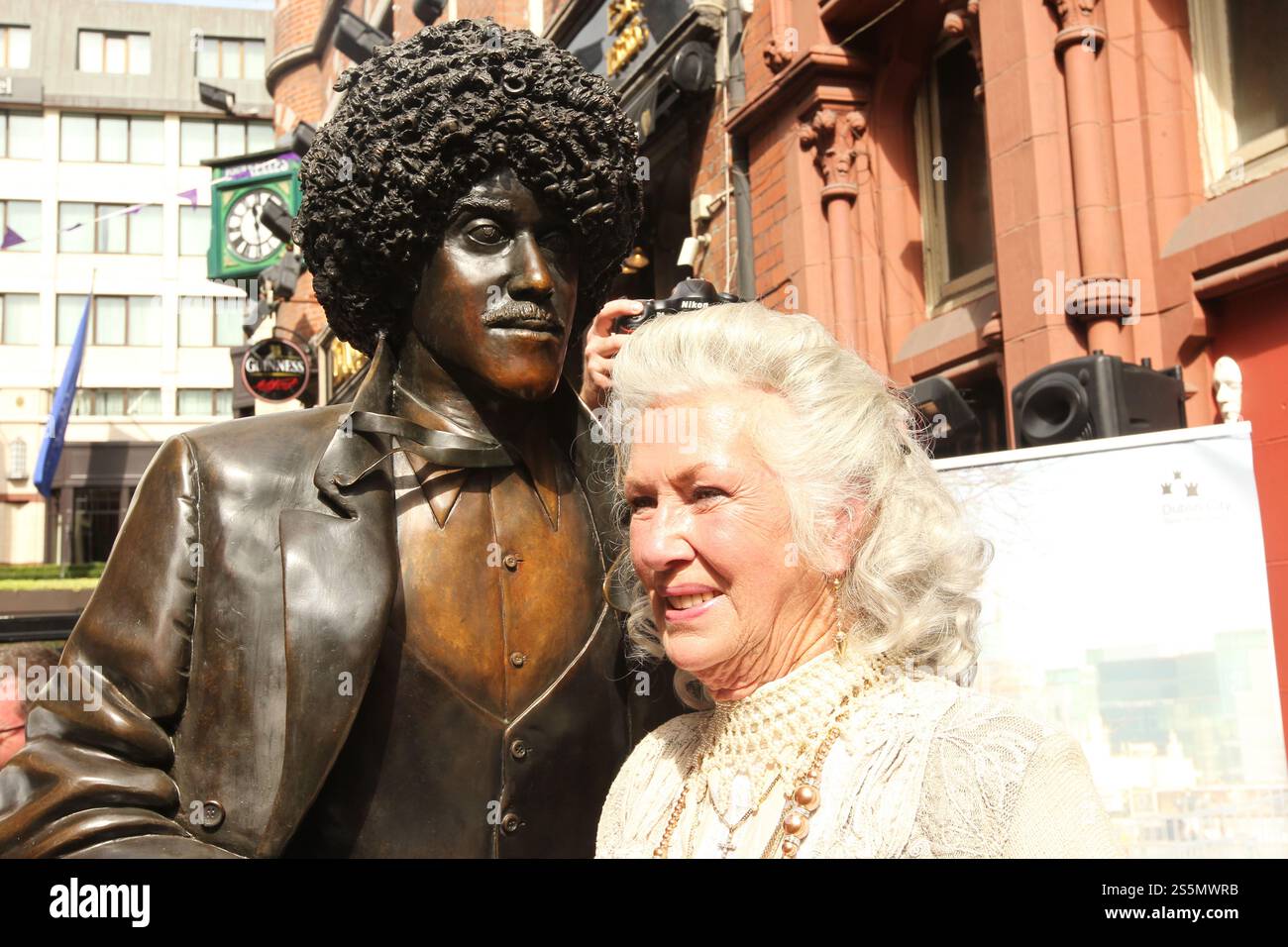 Dublin, Ireland - 15th August 2013 - Philmena Lynott with the statue ...