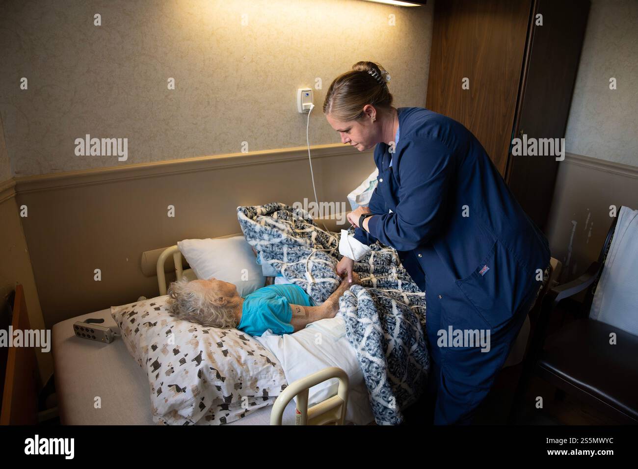 Portage, Indiana, USA. 3rd Aug, 2023. A hospice nurse takes vital signs ...