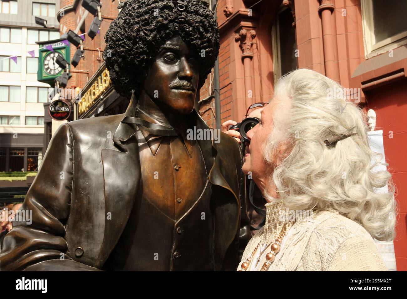Dublin, Ireland - 15th August 2013 - Philmena Lynott with the statue ...