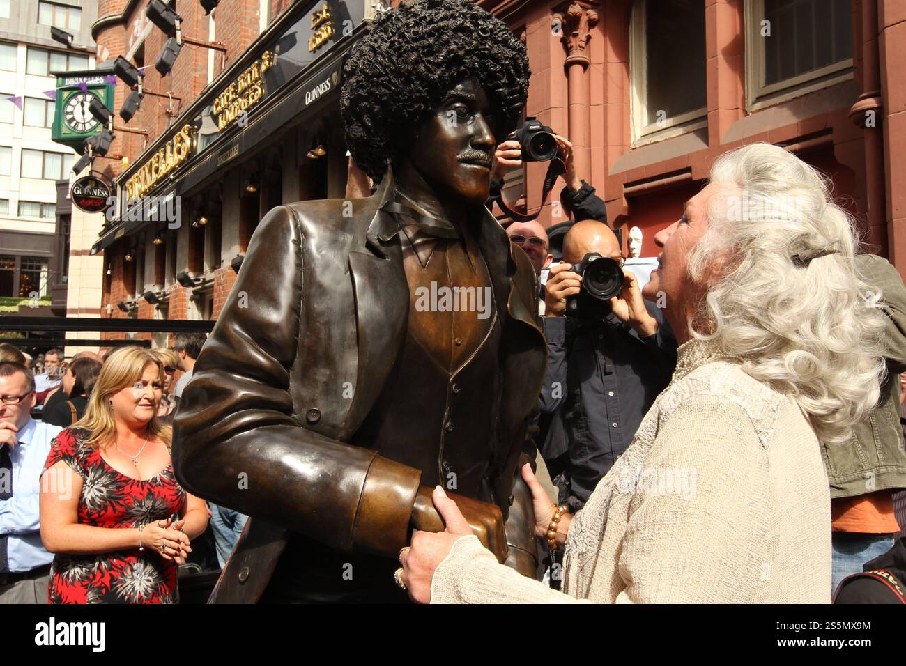 Dublin, Ireland - 15th August 2013 - Philmena Lynott with the statue ...