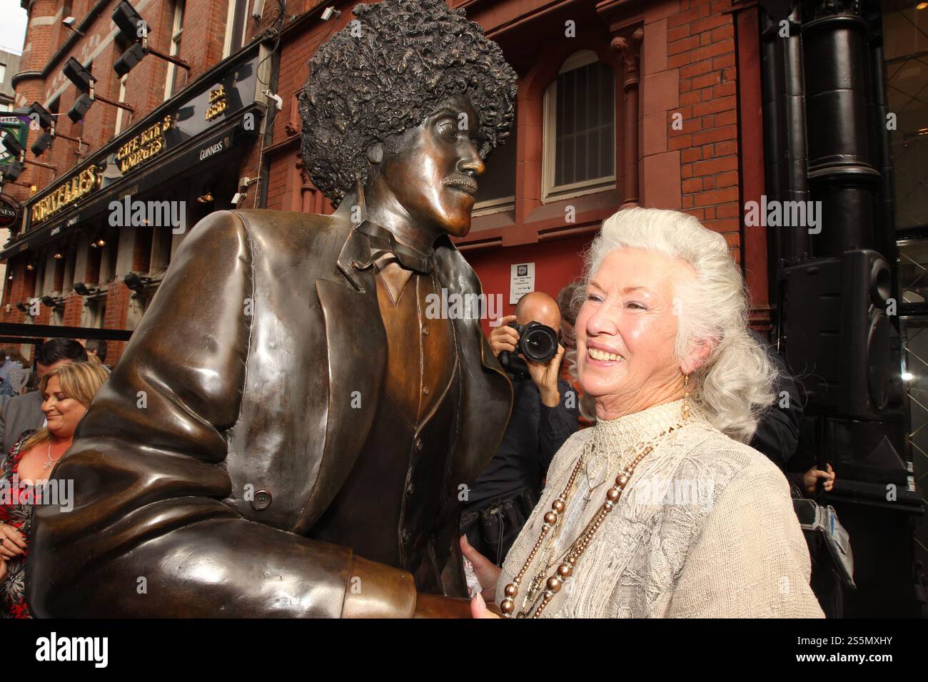 Dublin, Ireland - 15th August 2013 - Philmena Lynott with the statue ...