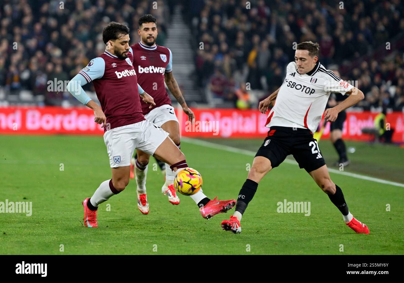London UK 14th January 2025. Lucas Paqueta (West Ham) and Timothy ...