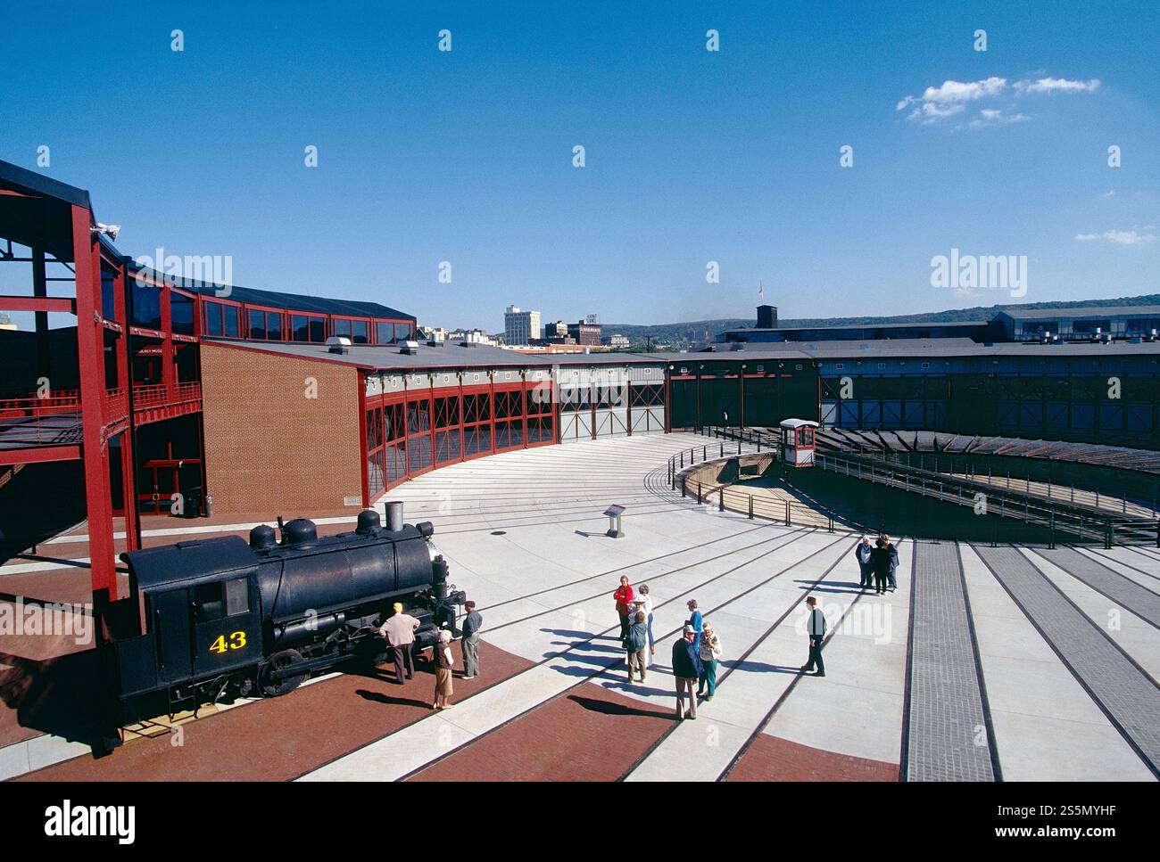 TOURISTS VIEW A LOCOMOTIVE AT STEAMTOWN NATIONAL HISTORIC SITE; LARGEST ...