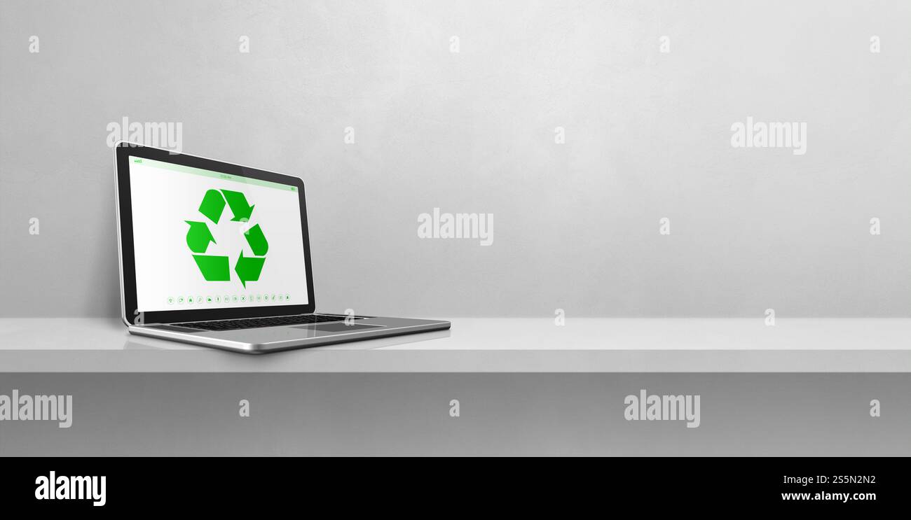 Laptop computer on a shelf with a recycling symbol on screen ...