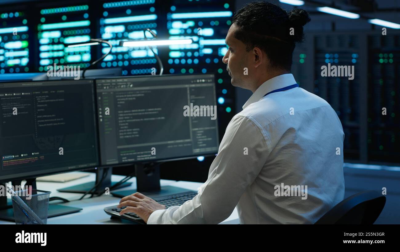 Engineer overseeing data center, making improvements and updates to ...