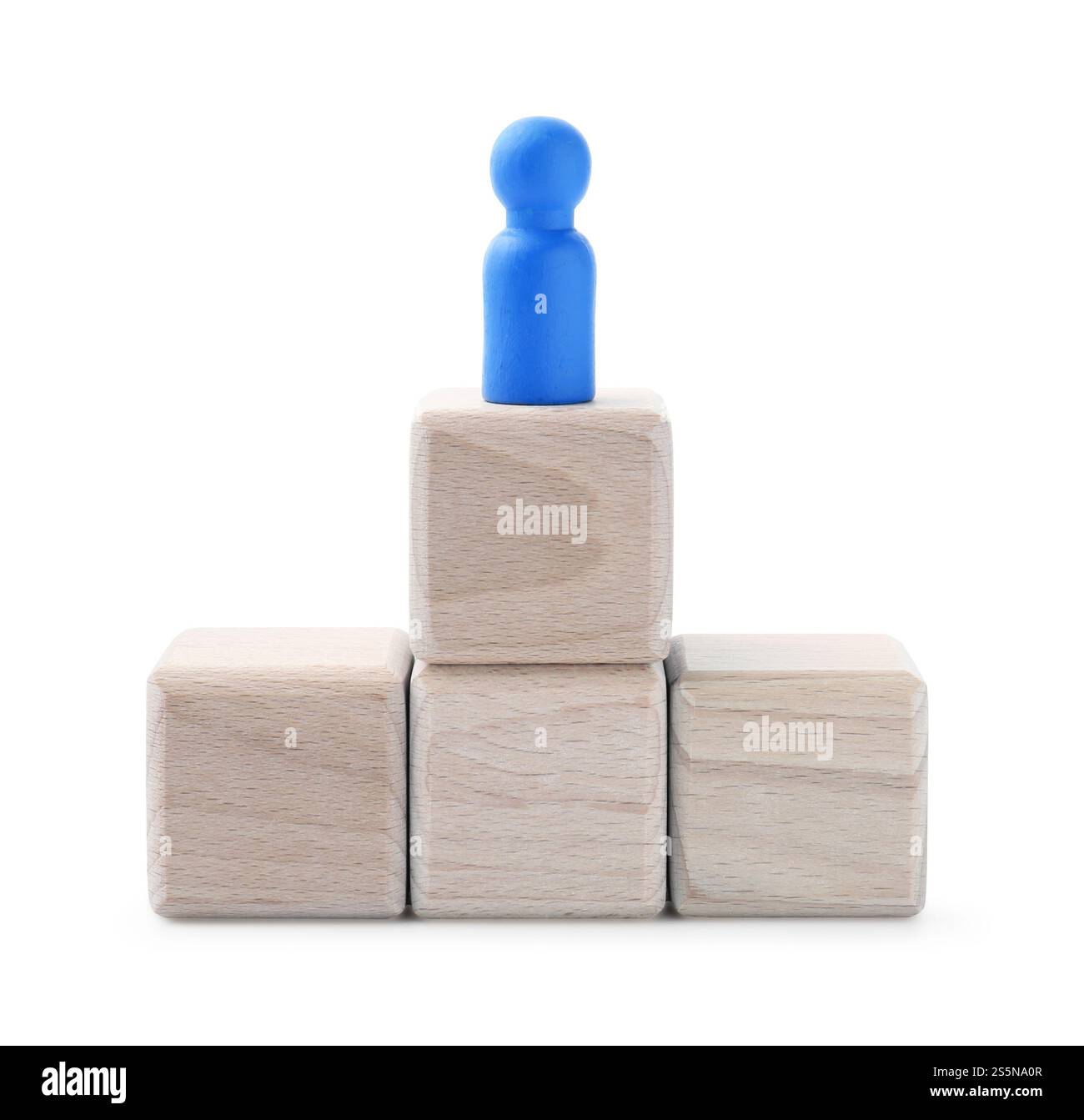 Blue human figure on wooden blocks against white background ...