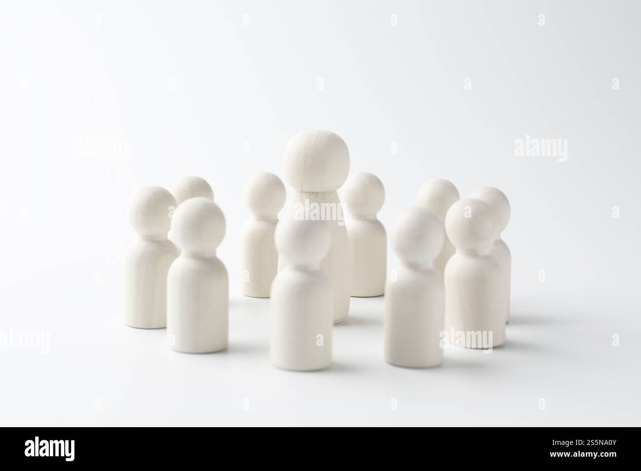 Big human figure among smaller ones on white background. Competition ...