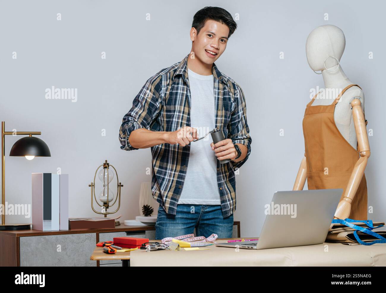 Young male holding full hi-res stock photography and images - Alamy