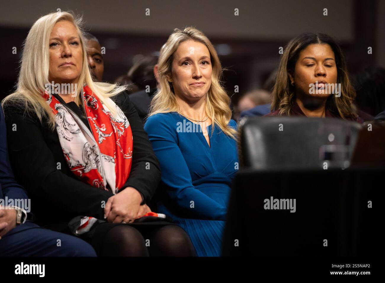 At center, Jennifer Rauchet, wife of Pete Hegseth, President-elect ...