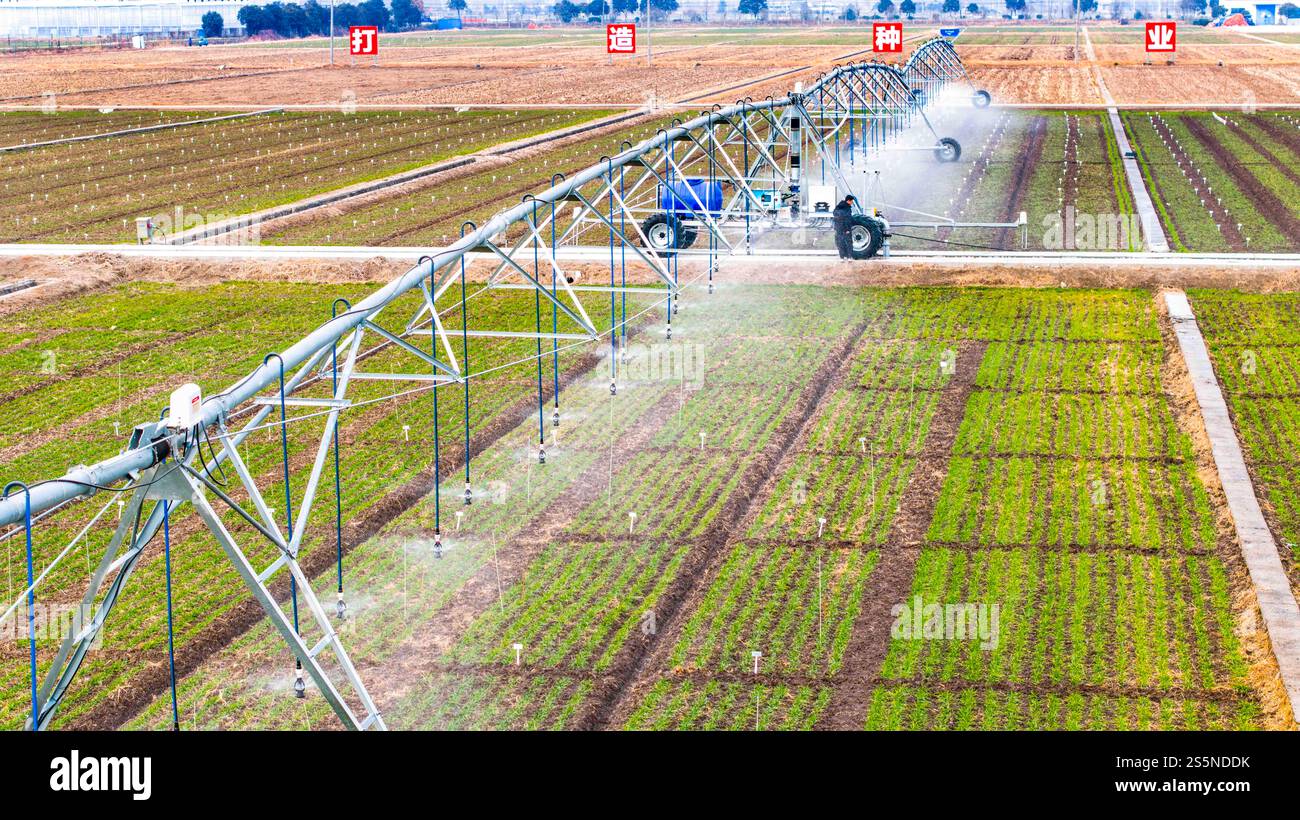HUAI'AN, CHINA - JANUARY 14, 2025 - Parallel walking water, fertilizer ...