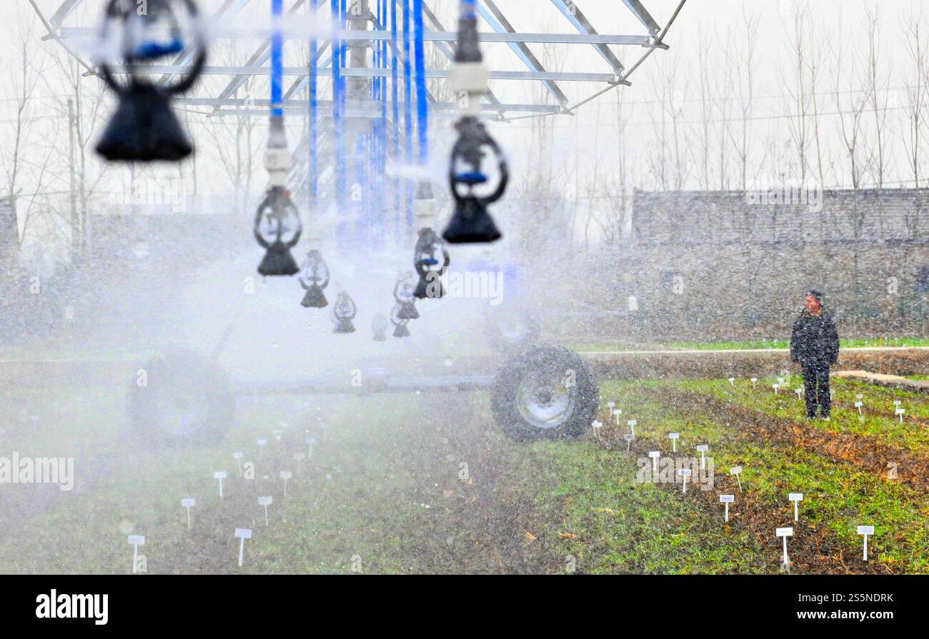 HUAI'AN, CHINA - JANUARY 14, 2025 - Parallel walking water, fertilizer ...