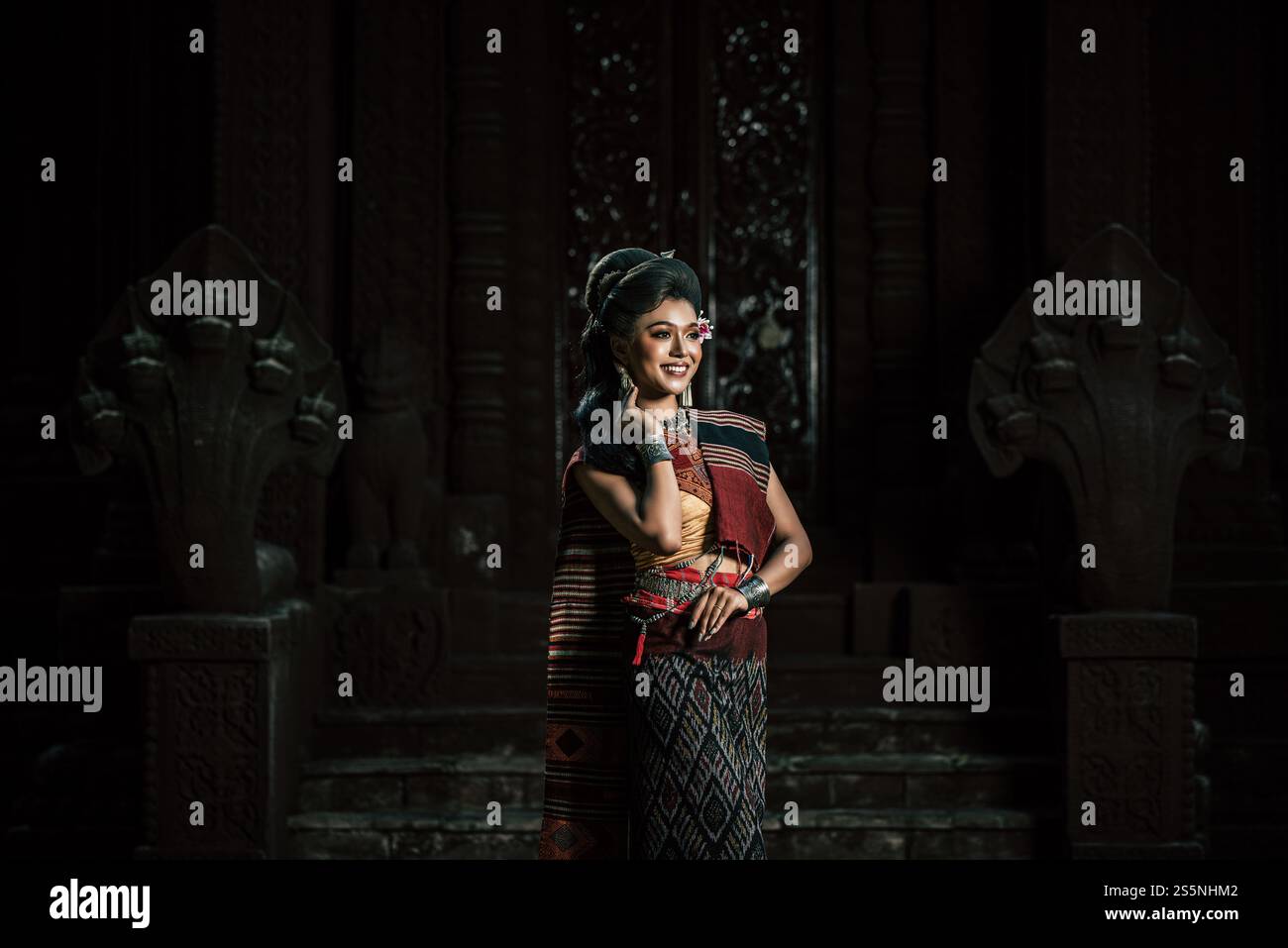 Young female Actress wearing beautiful ancient costumes, in ancient monuments, dramatic style ...