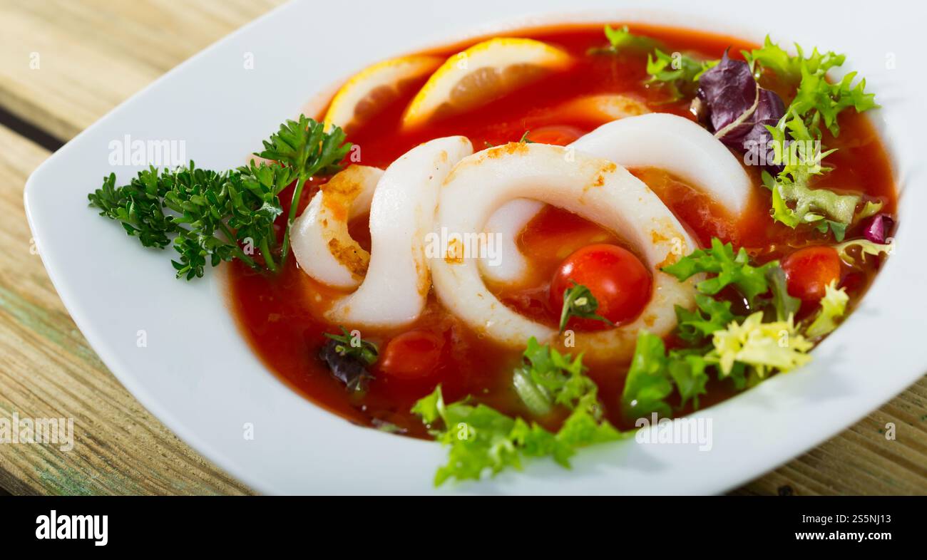 Mediterranean cuisine - tomato soup with squid Stock Photo - Alamy
