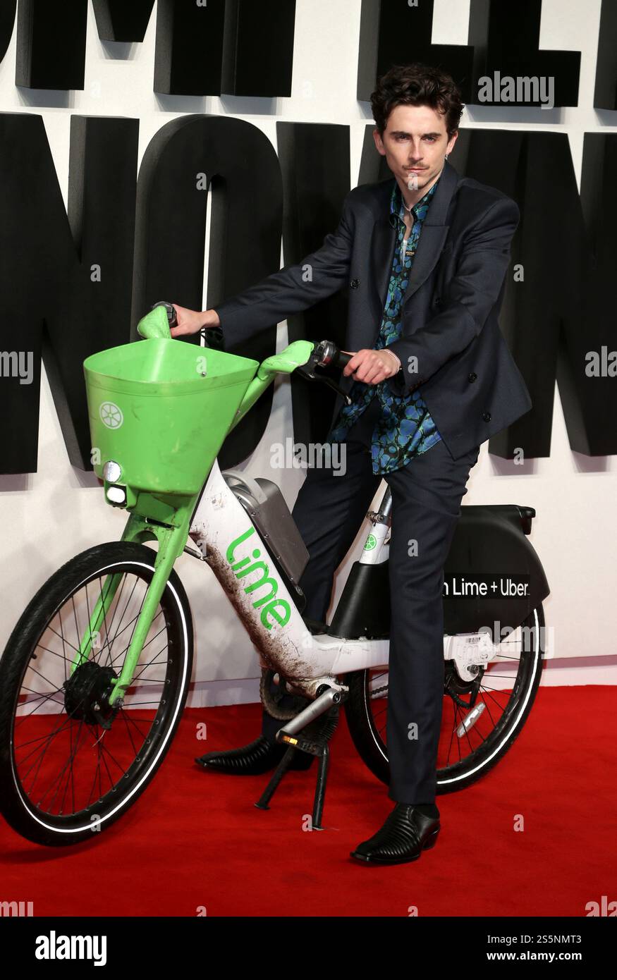 London, UK. 14th Jan, 2025. Timothée Chalamet arrives on a Lime Bike as ...