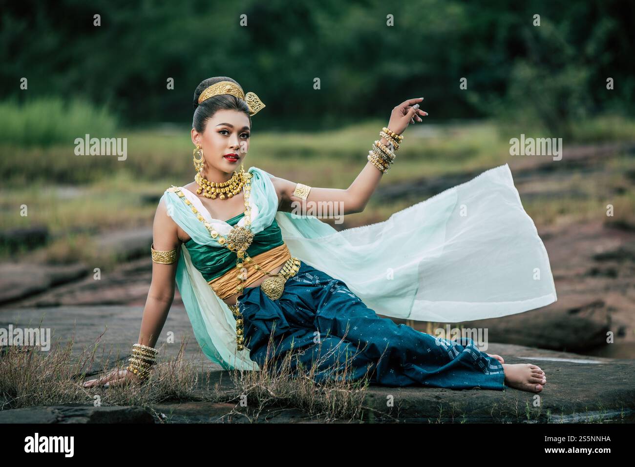 Portrait young beautiful woman wearing in traditional with ornament ...