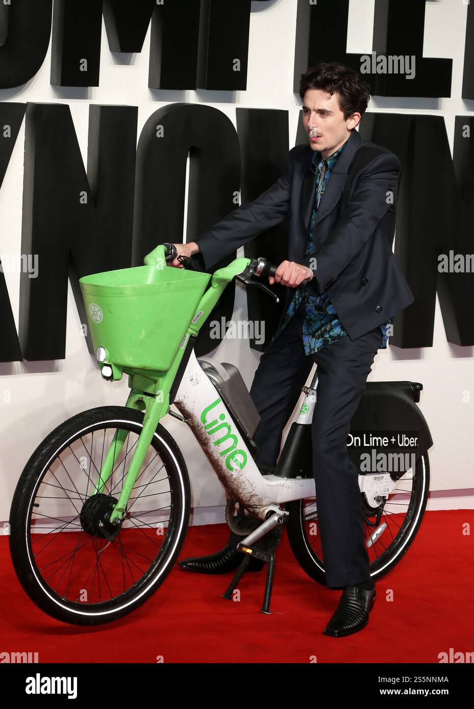 London, UK. 14th Jan, 2025. Timothée Chalamet arrives on a Lime Bike as ...
