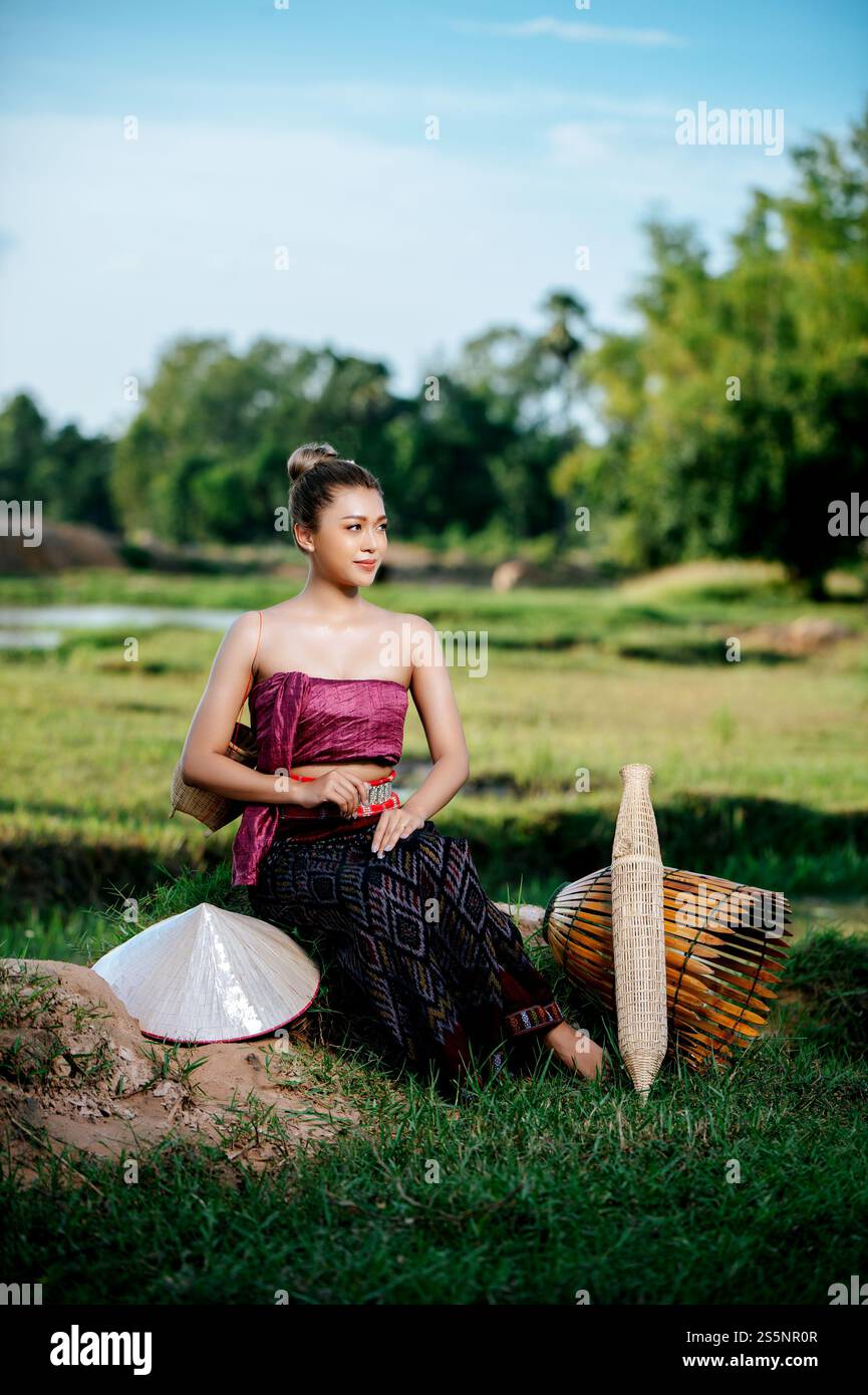 Portrait Young pretty Asian woman in beautiful Thai traditional clothes ...