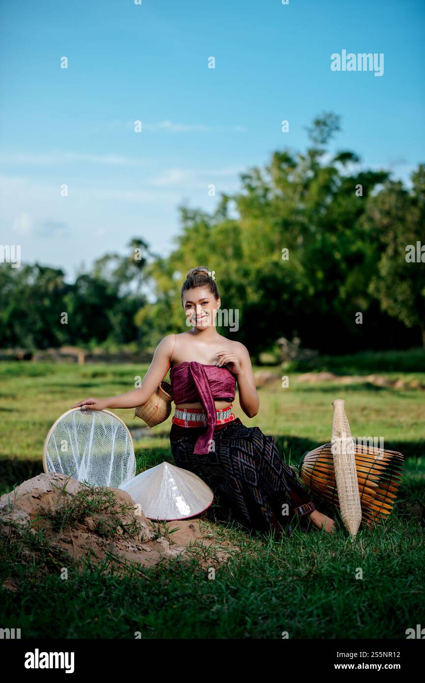 Portrait Young pretty Asian woman in beautiful Thai traditional clothes ...