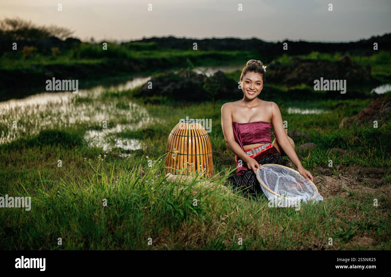 Portrait Young pretty Asian woman in beautiful Thai traditional clothes ...