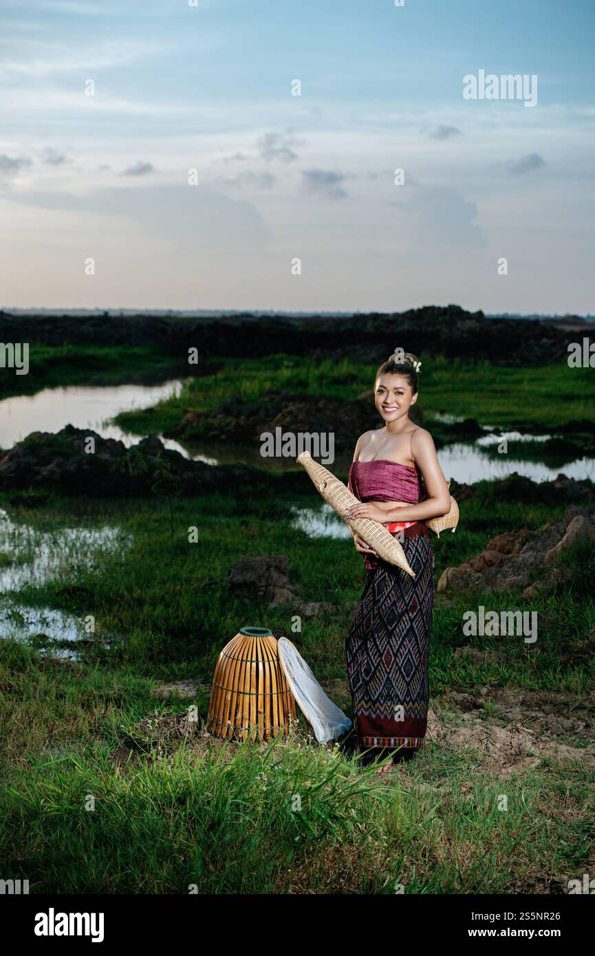 Portrait Young pretty Asian woman in beautiful Thai traditional clothes ...