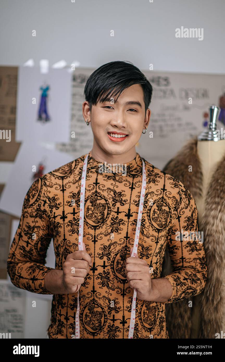 Young asian male entrepreneur smiling hi-res stock photography and images - Alamy