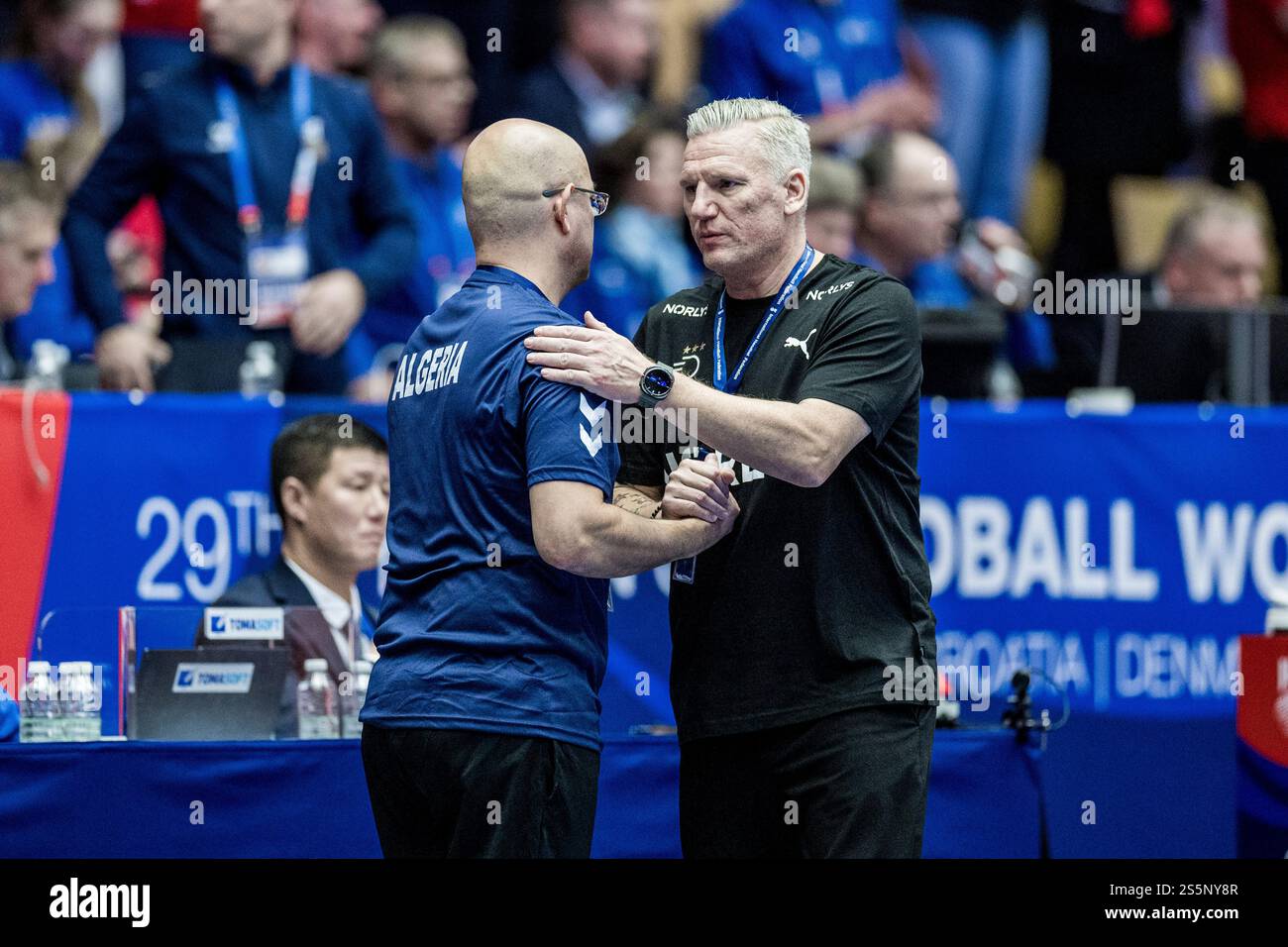 Herning, Denmark. 14th Jan, 2025. Head coach Nikolaj Jacobsen (R) of ...